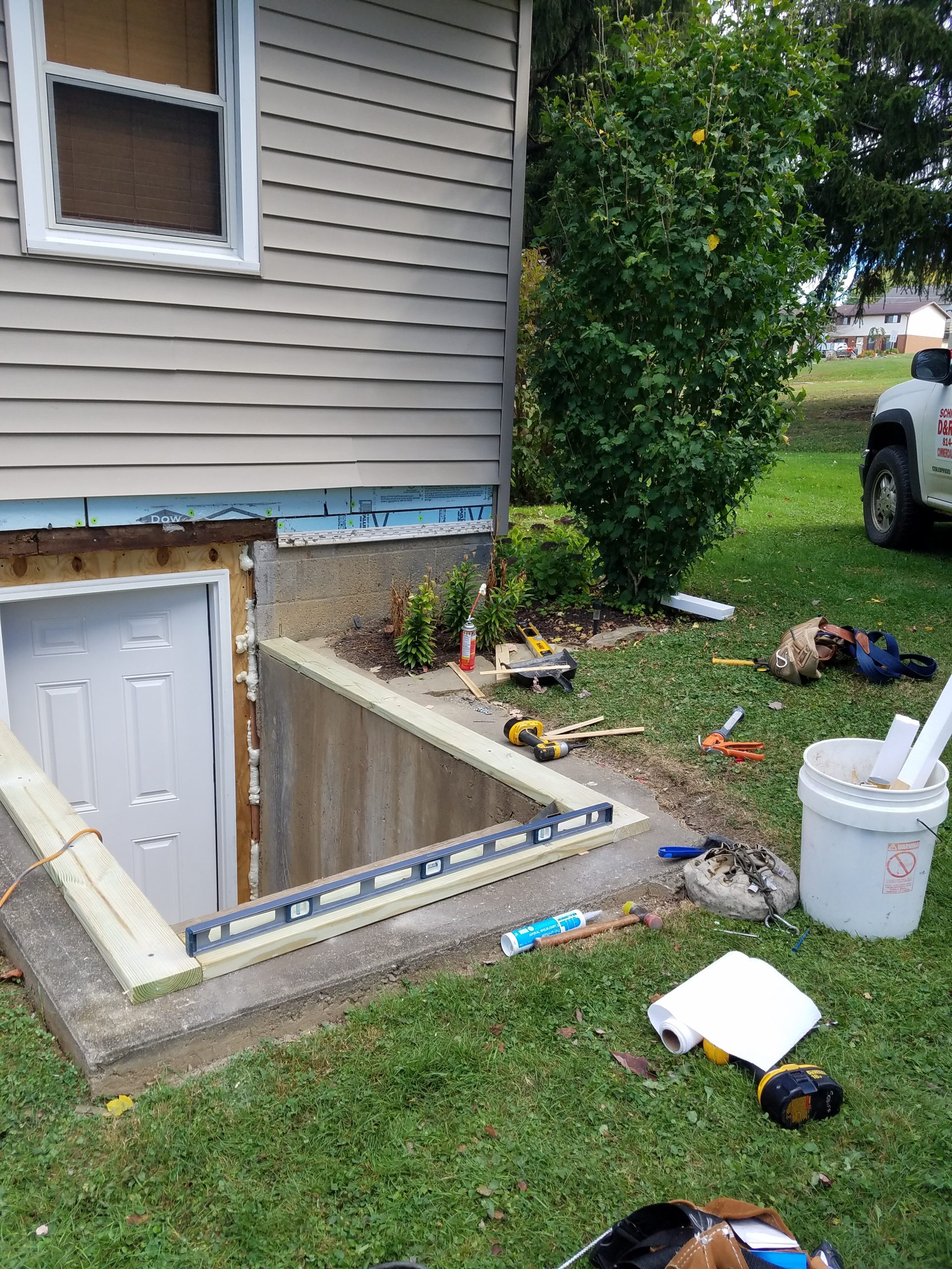 Residential Basement Door, During and After – Schiffer's Glass